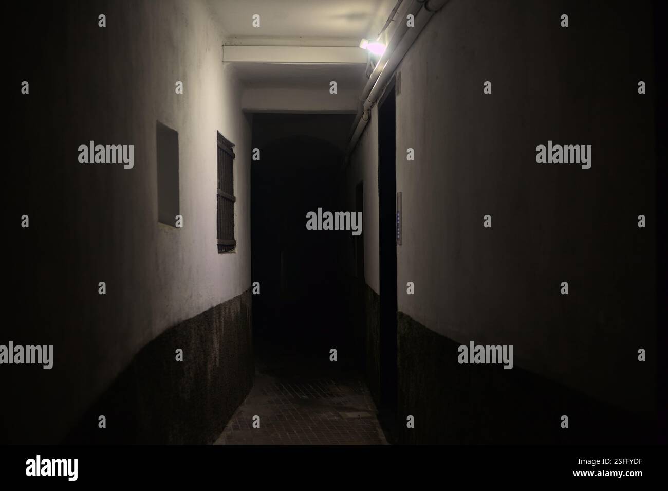 Narrow concrete entrance house hi-res stock photography and images - Alamy