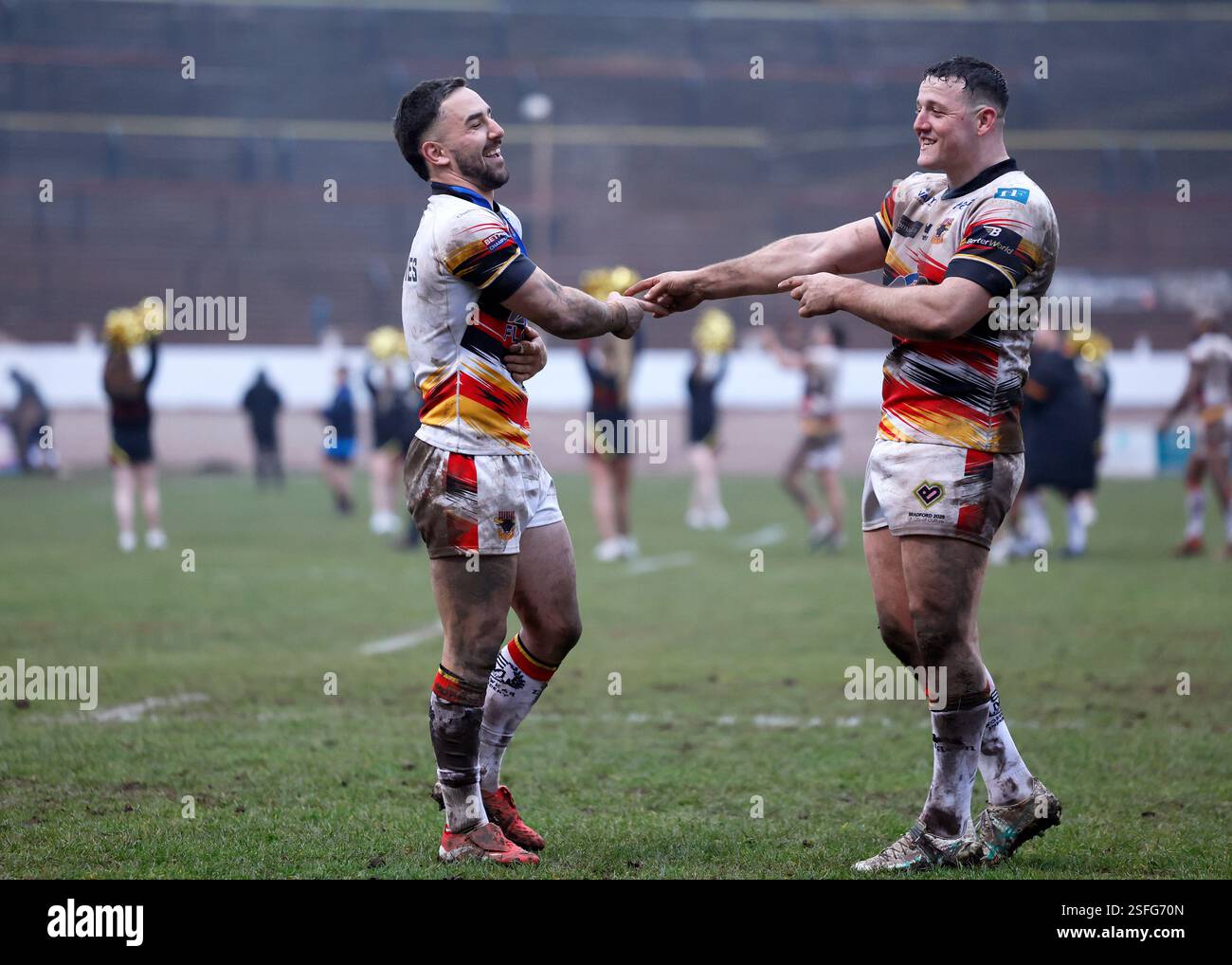 Bradford Bulls' Tom Holmes (left) and Matty Gee celebrate the win after ...