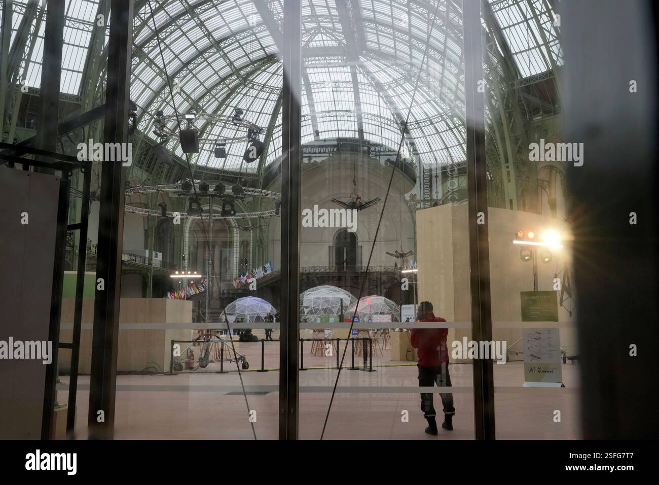 A security guard stands inside the entrance of the Grand Palais, which ...