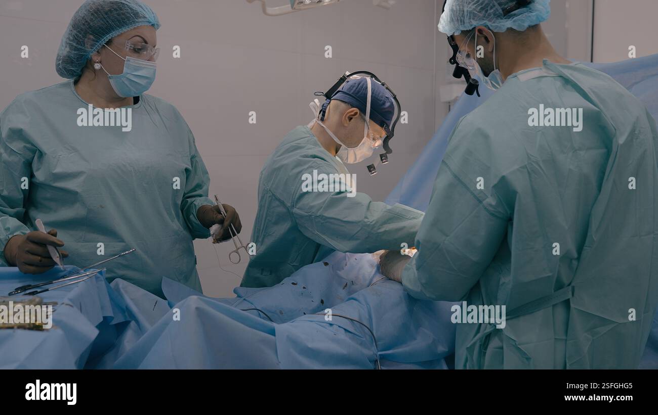 Doctor assisting patient stand hi-res stock photography and images - Alamy