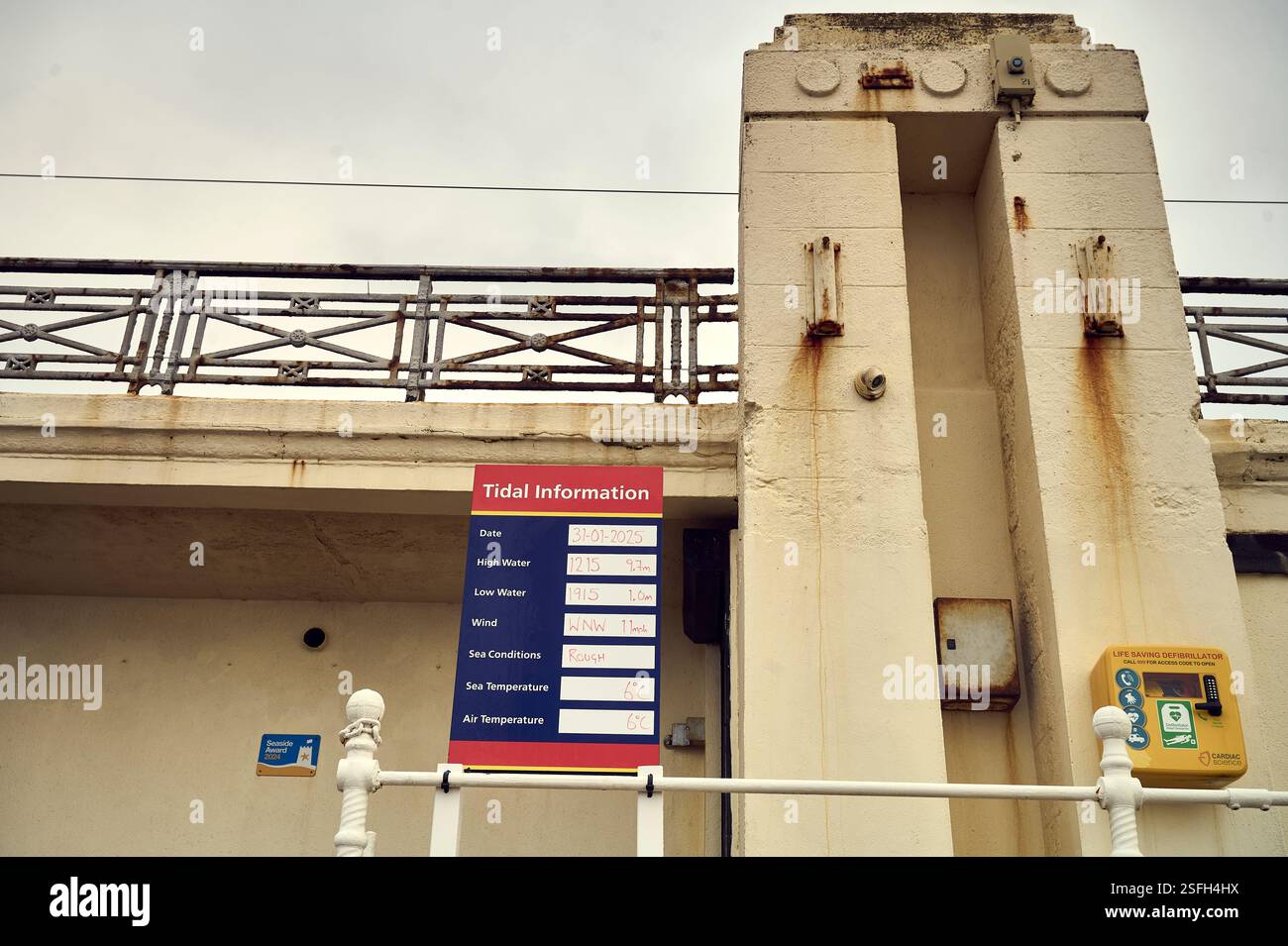 Tidal information board on Blackpool seafront Stock Photo - Alamy