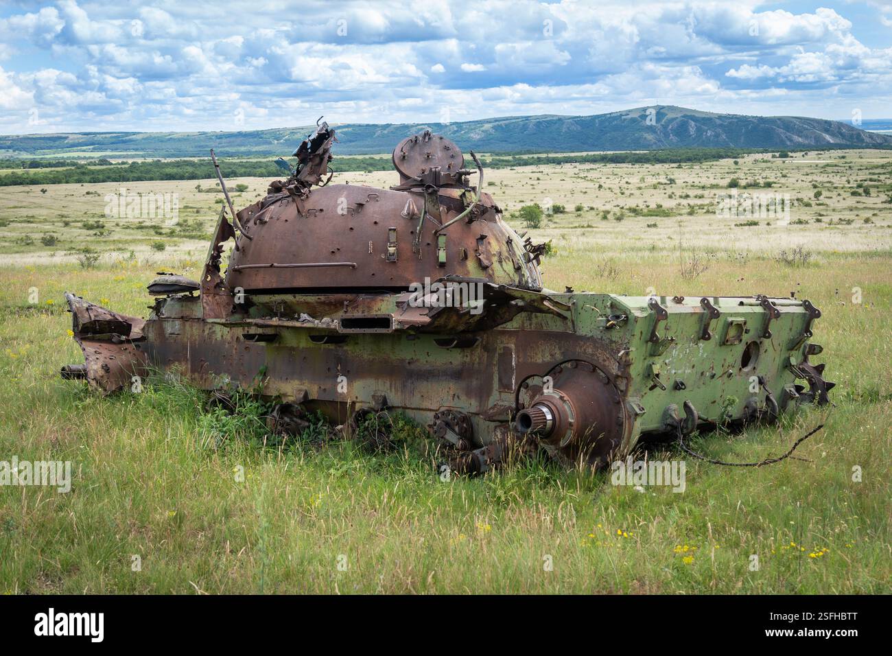 Old destroyed T-54 Russian tank on a grassy field Stock Photo - Alamy