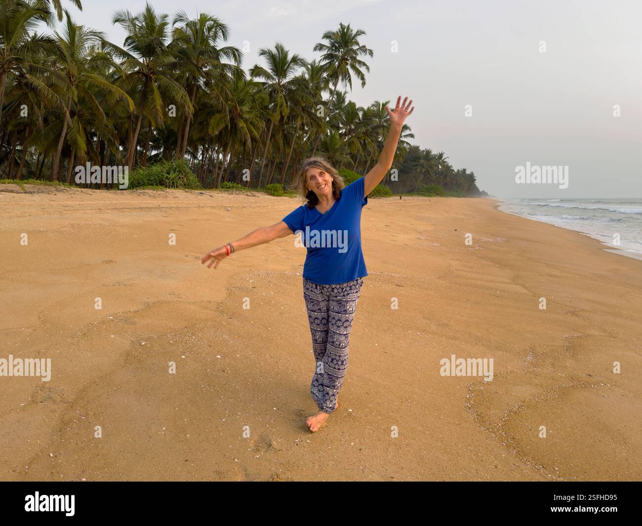Christine Kolisch on a beautiful deserted beach grace NIleshwar in the ...