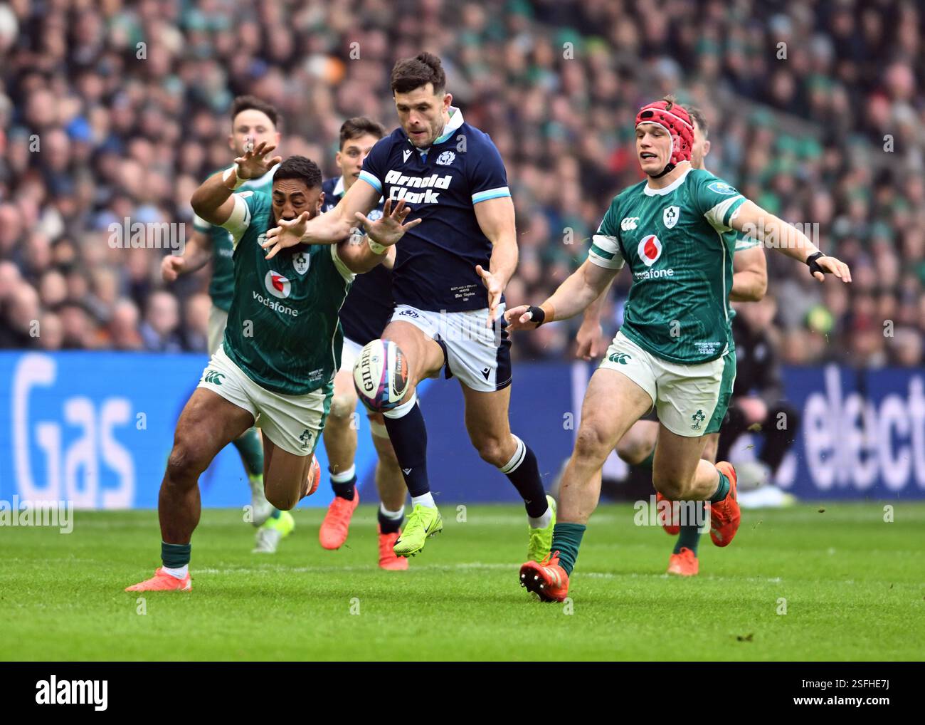 Edinburgh, UK. 9th Feb, 2025. Bundee Aki of Ireland, Blair Kinghorn of ...