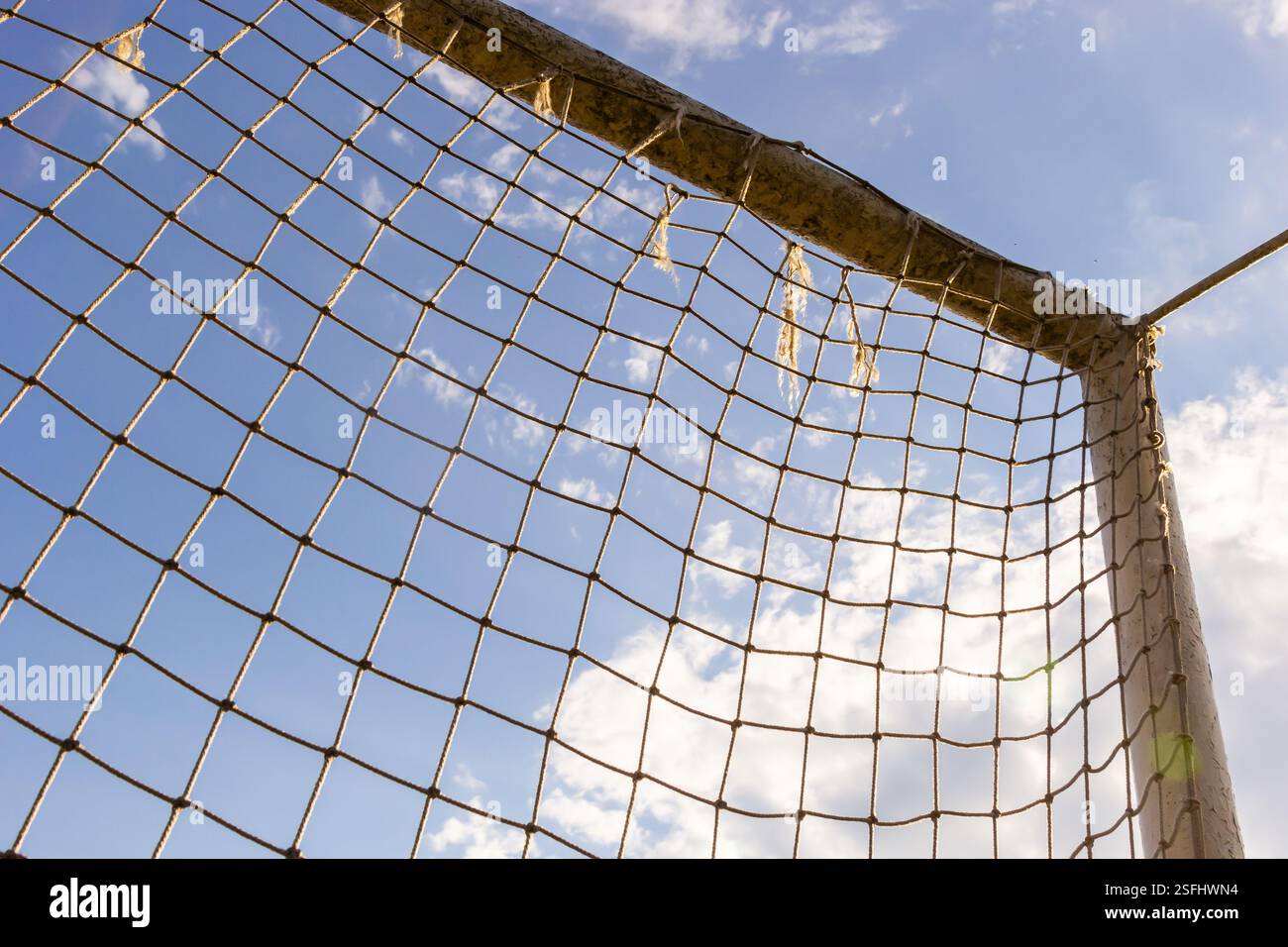 Frayed soccer net hi-res stock photography and images - Alamy