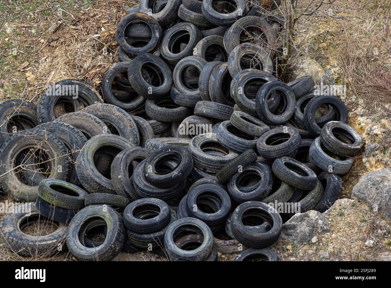 Large collection discarded tires hi-res stock photography and images ...
