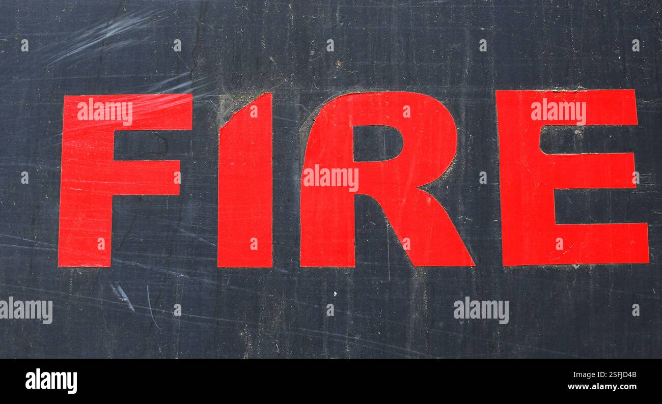 Rustic, letters spelling fire adhere to the side of trailer used by ...