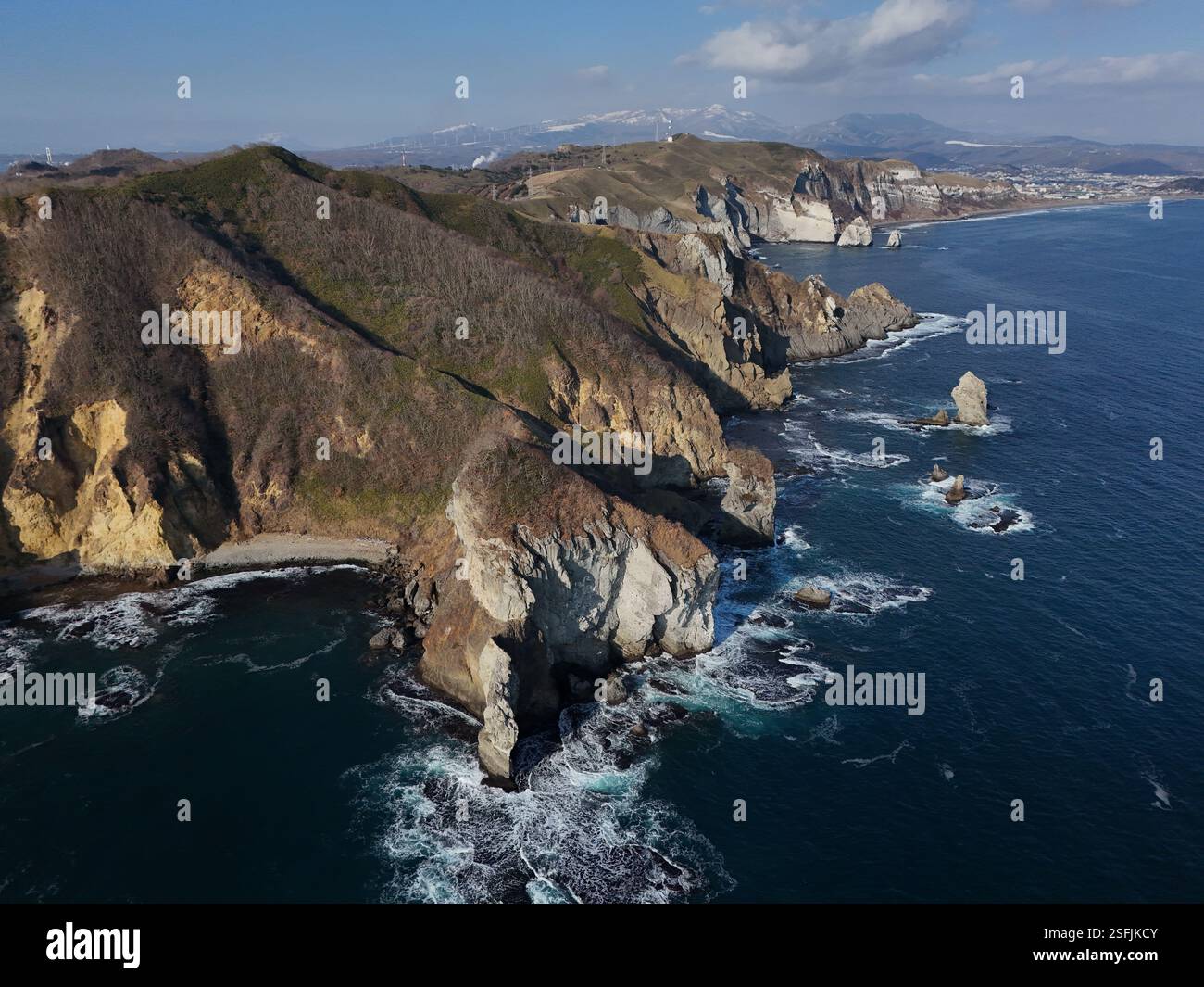 Aerial view of Cape Chikyu with rough sea breaking on cliff Stock Photo ...