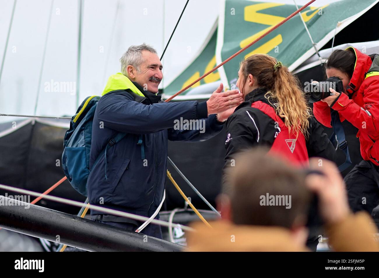 French skipper Violette Dorange celebrates on her Imoca monohull ...