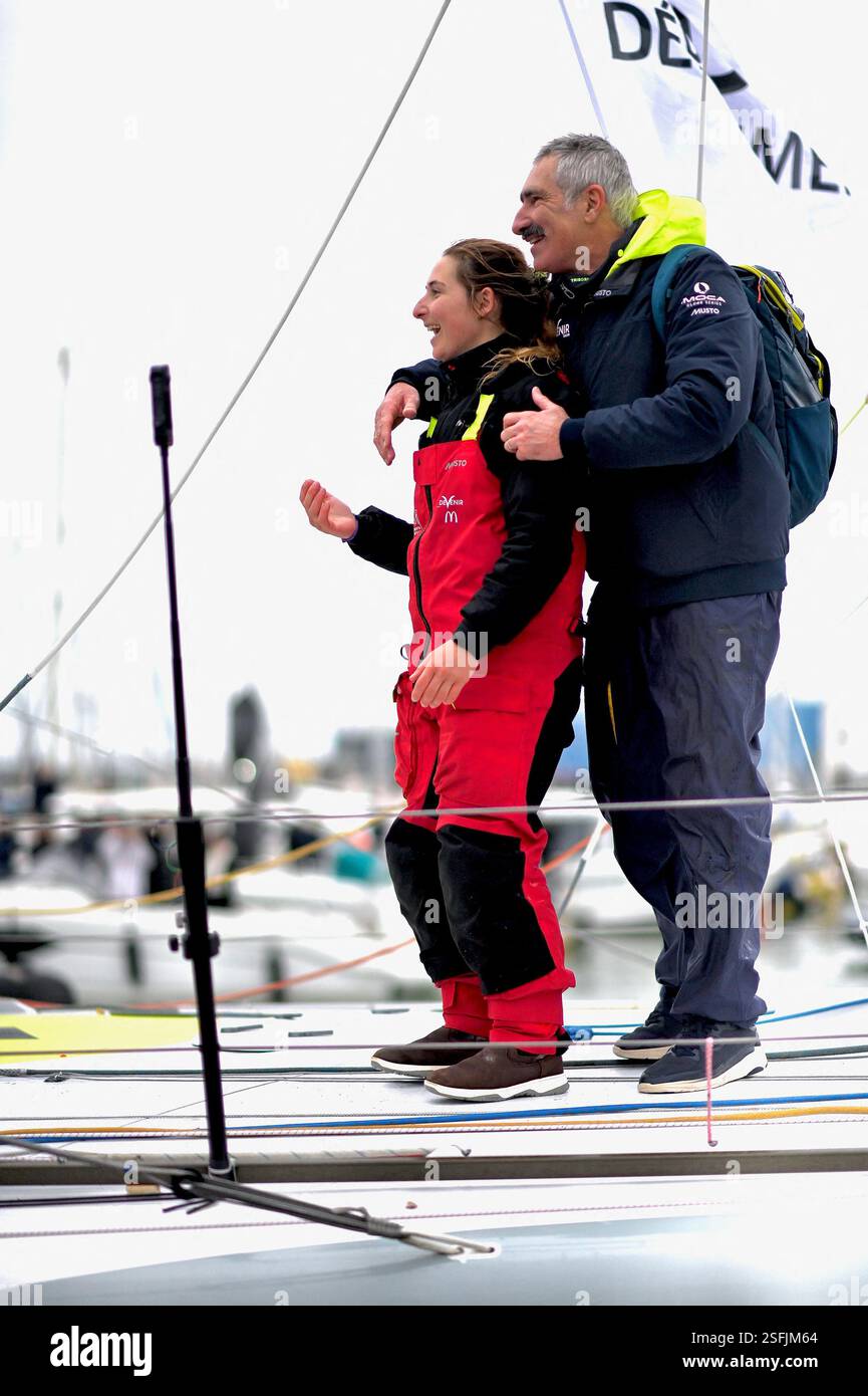 French skipper Violette Dorange celebrates on her Imoca monohull ...