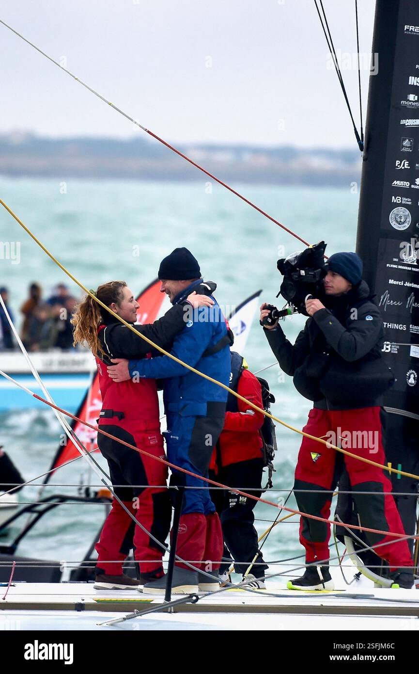 French skipper Violette Dorange celebrates on her Imoca monohull ...