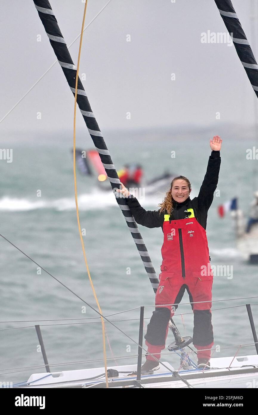 French skipper Violette Dorange celebrates on her Imoca monohull ...