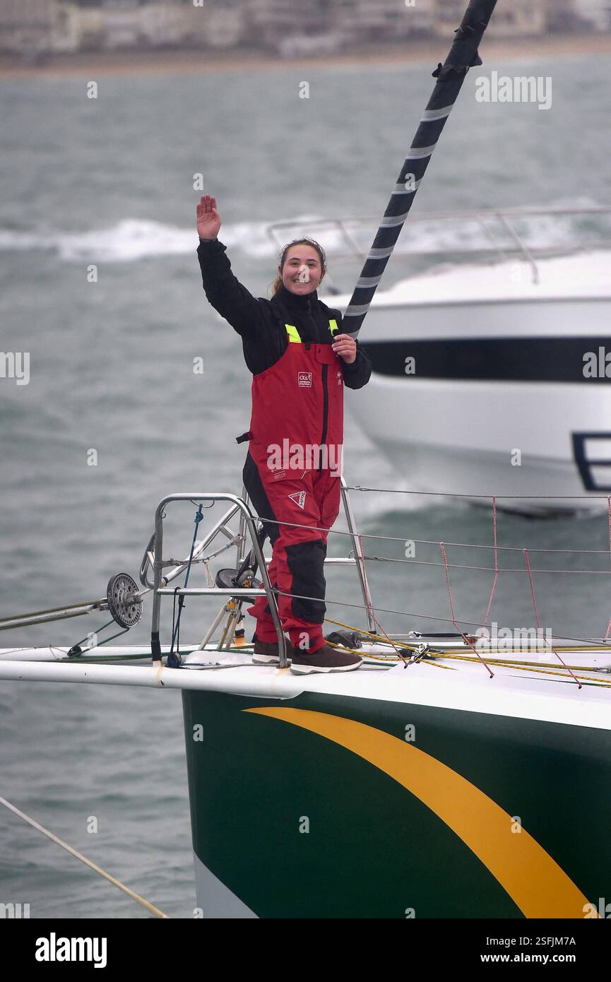 French skipper Violette Dorange celebrates on her Imoca monohull ...