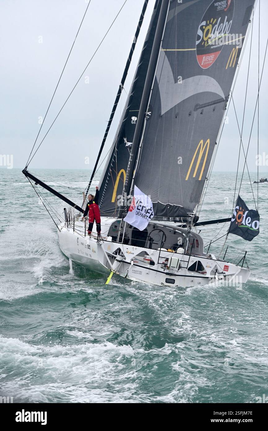 French skipper Violette Dorange celebrates on her Imoca monohull ...