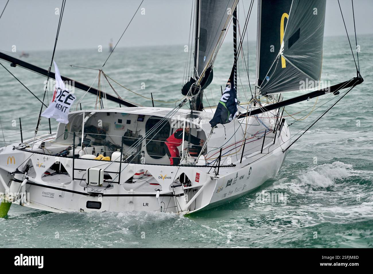 French skipper Violette Dorange celebrates on her Imoca monohull ...
