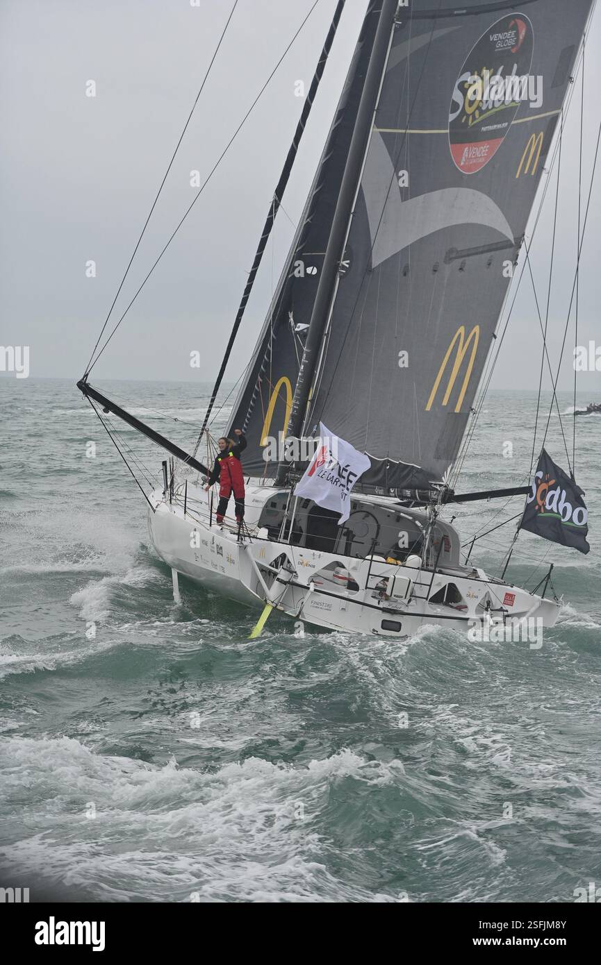 French skipper Violette Dorange celebrates on her Imoca monohull ...