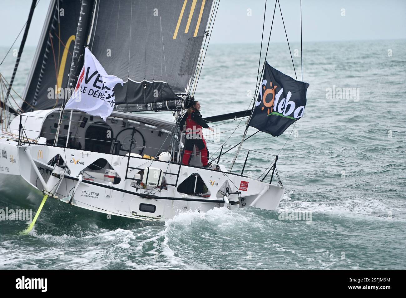 French skipper Violette Dorange celebrates on her Imoca monohull ...