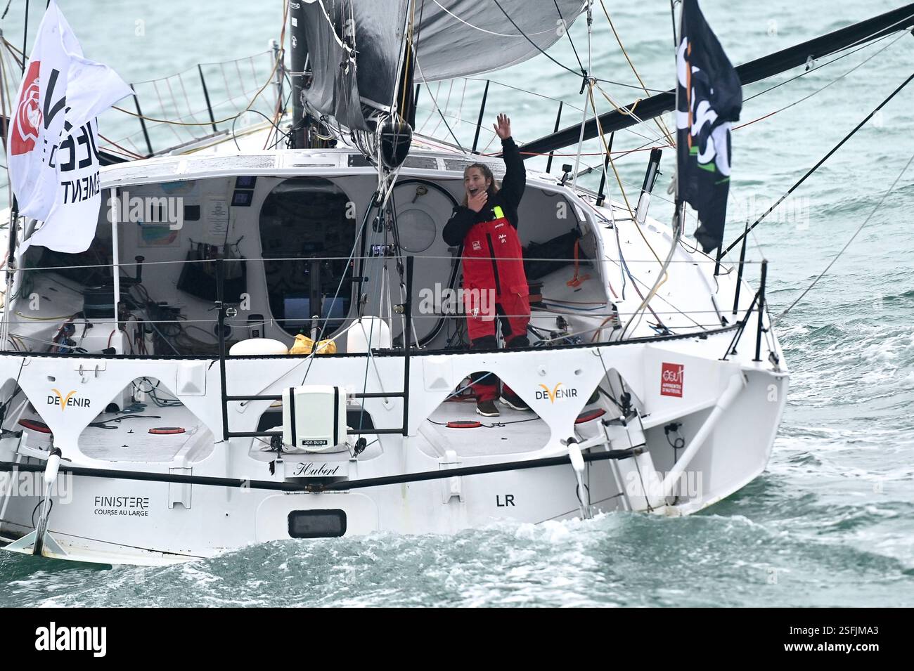 French skipper Violette Dorange celebrates on her Imoca monohull ...