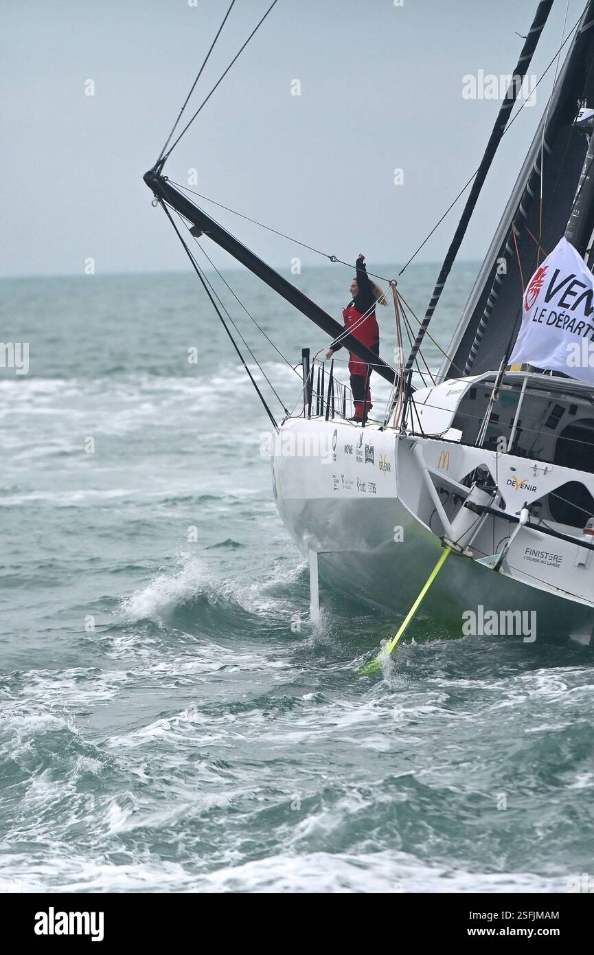 French skipper Violette Dorange celebrates on her Imoca monohull ...