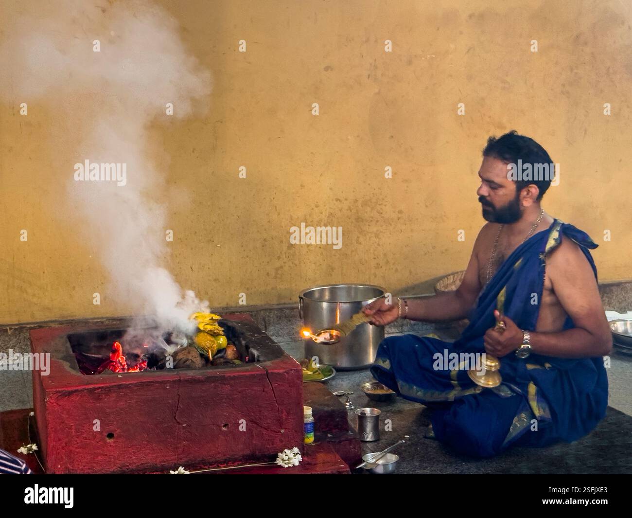 A Fire Puja at the Hindu Kandri Manjunath Temple which is Shiva based ...