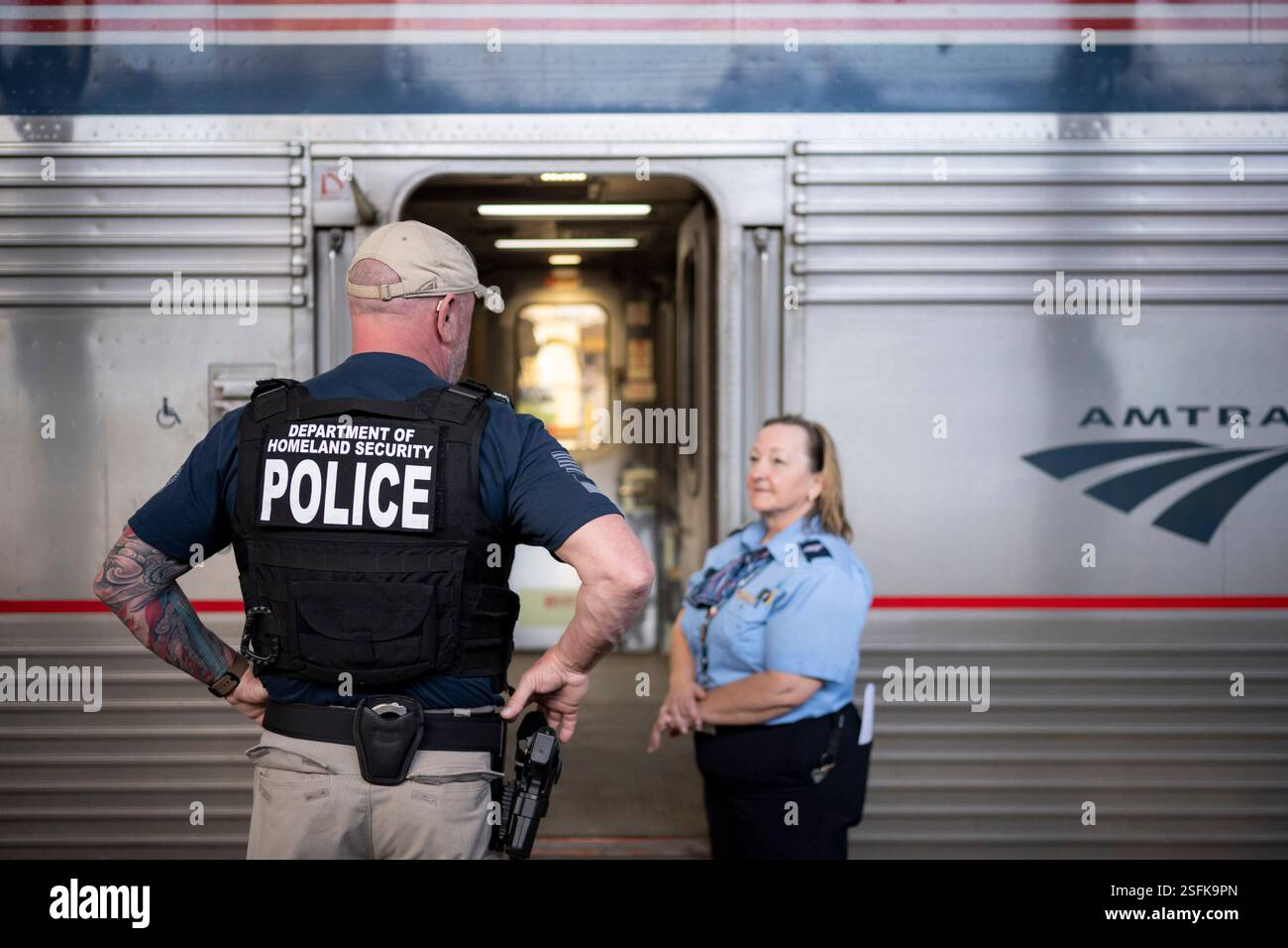 Employees with the Department of Homeland Security (DHS) Transportation ...