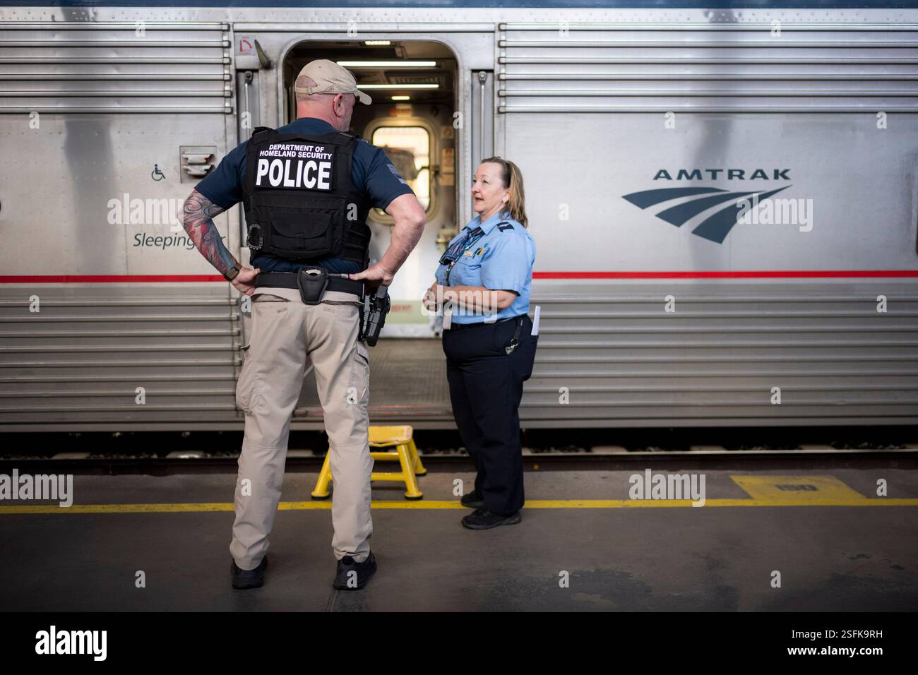 Employees with the Department of Homeland Security (DHS) Transportation ...