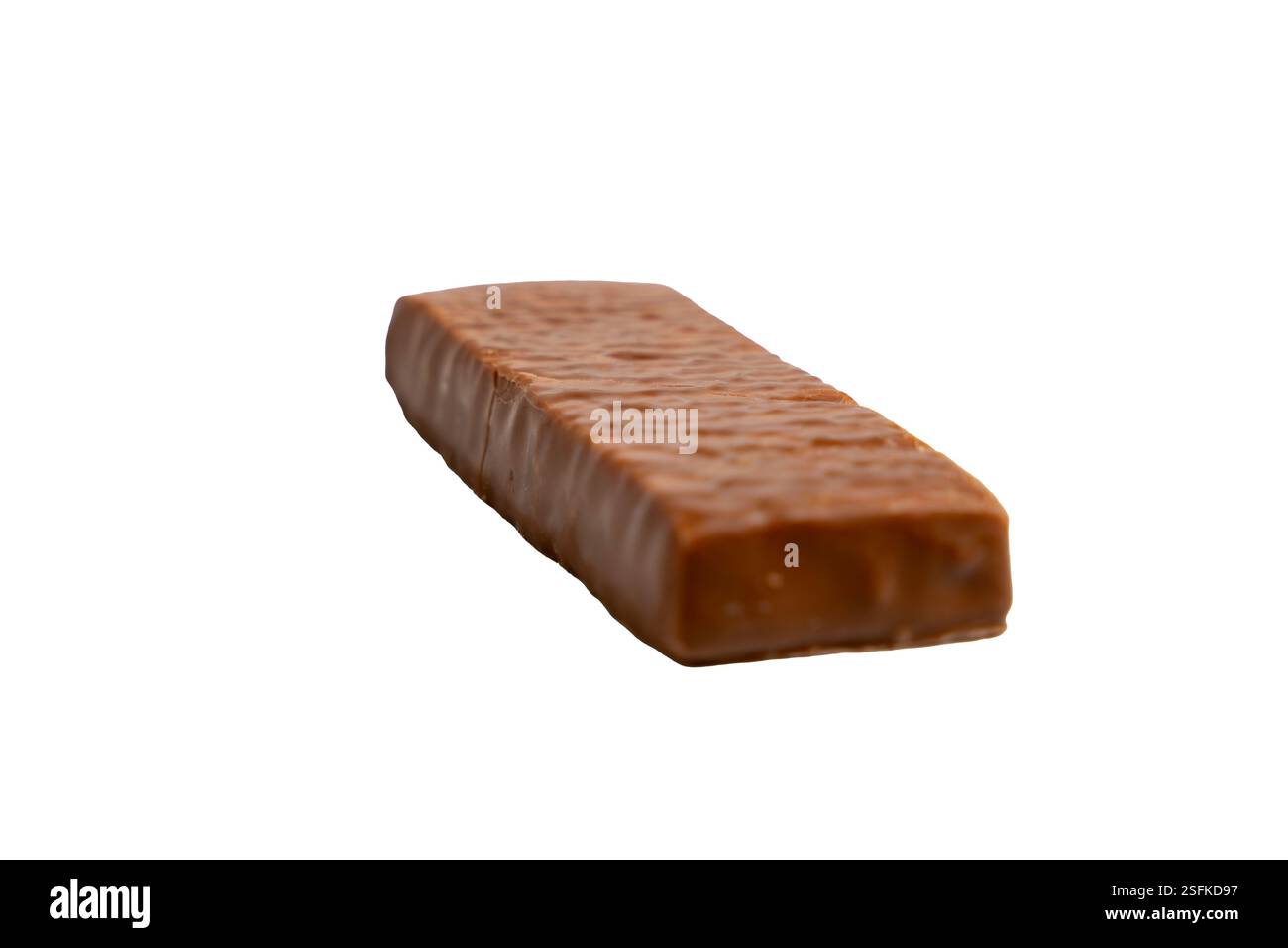 A brown bar of chocolate. It is sitting on a white background. The bar ...