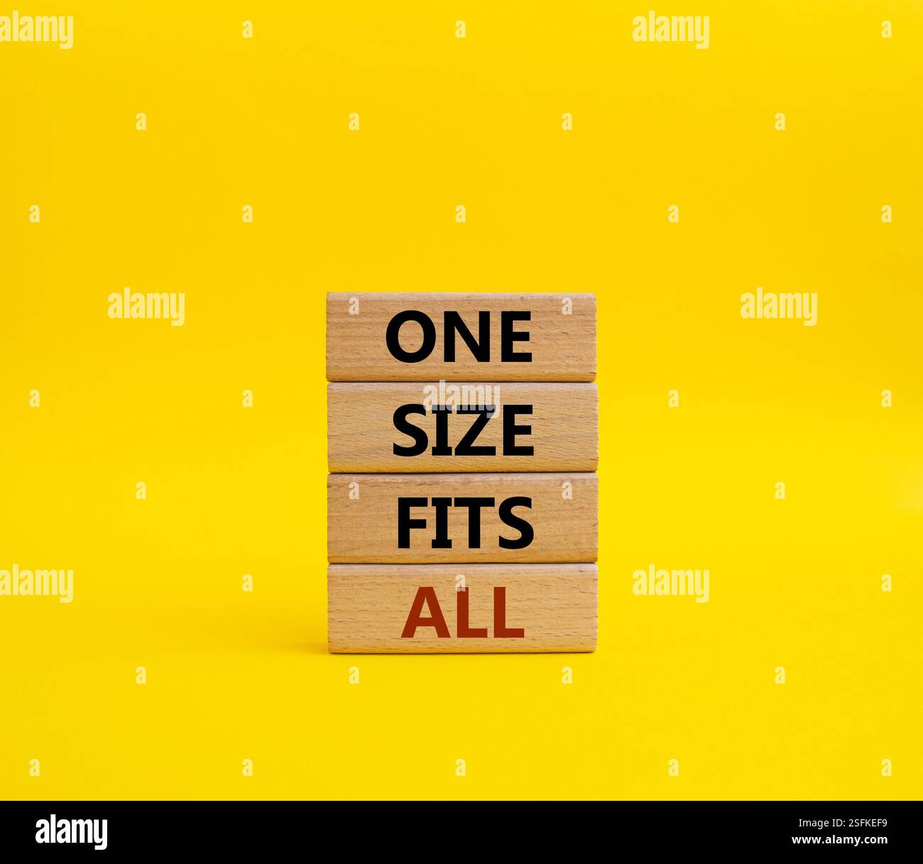 One size fits all symbol. Concept words One size fits all on wooden ...