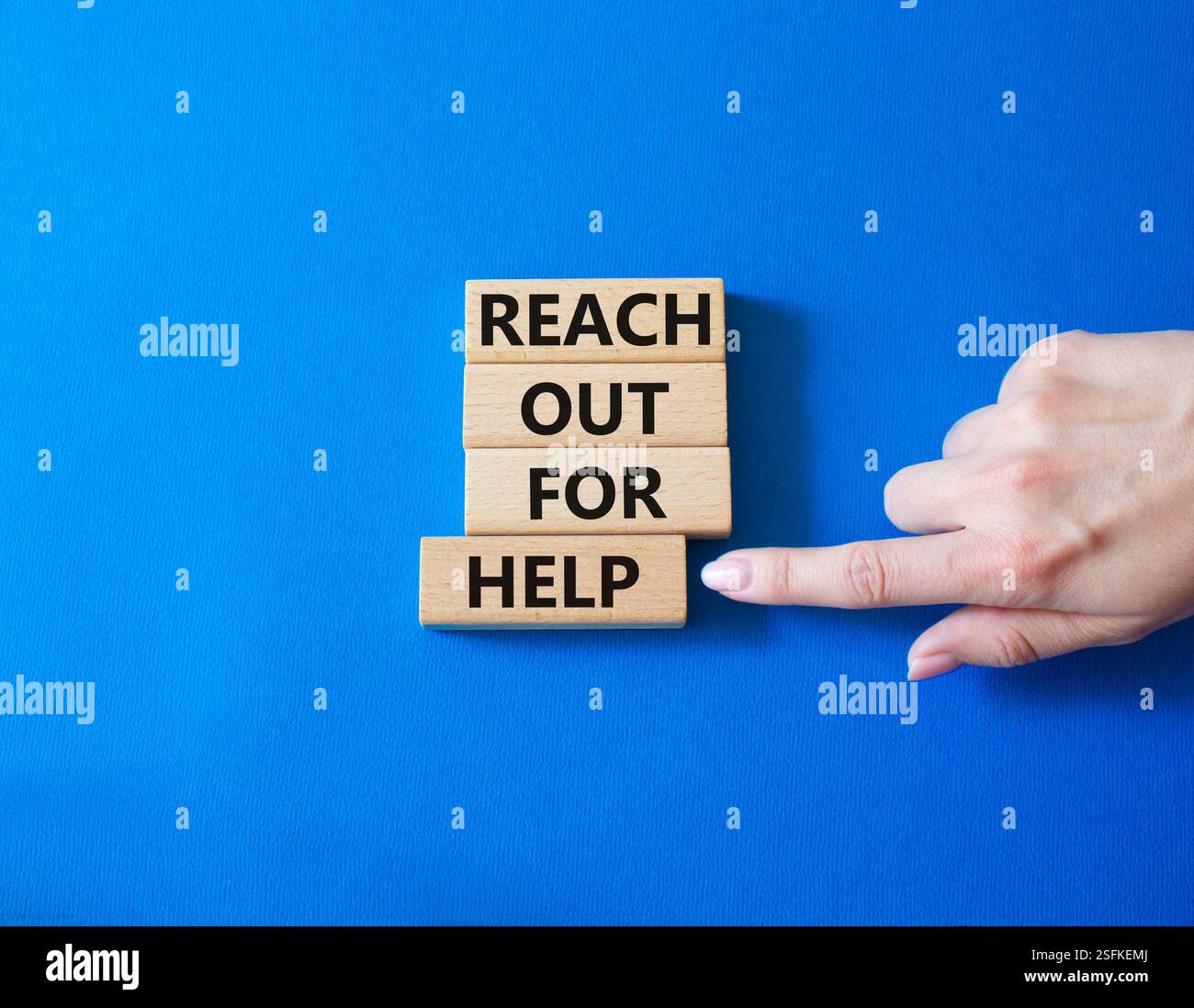 Reach out for help symbol. Wooden blocks with words Reach out for help ...