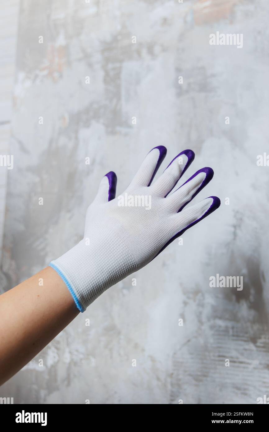 A closeup of a uniquely textured glove showcasing its durability and ...