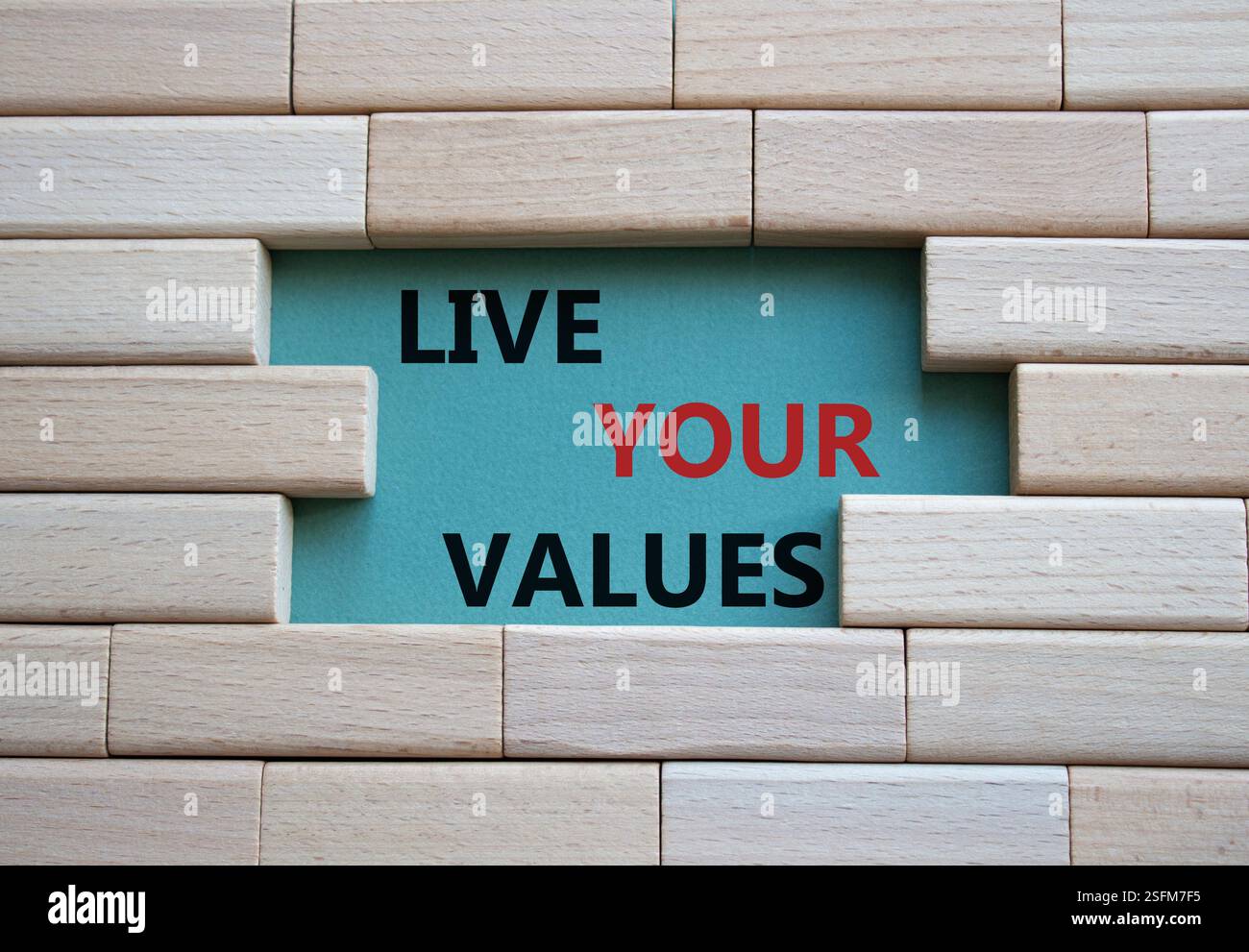 Live your values symbol. Concept words 'Live your values' on wooden ...