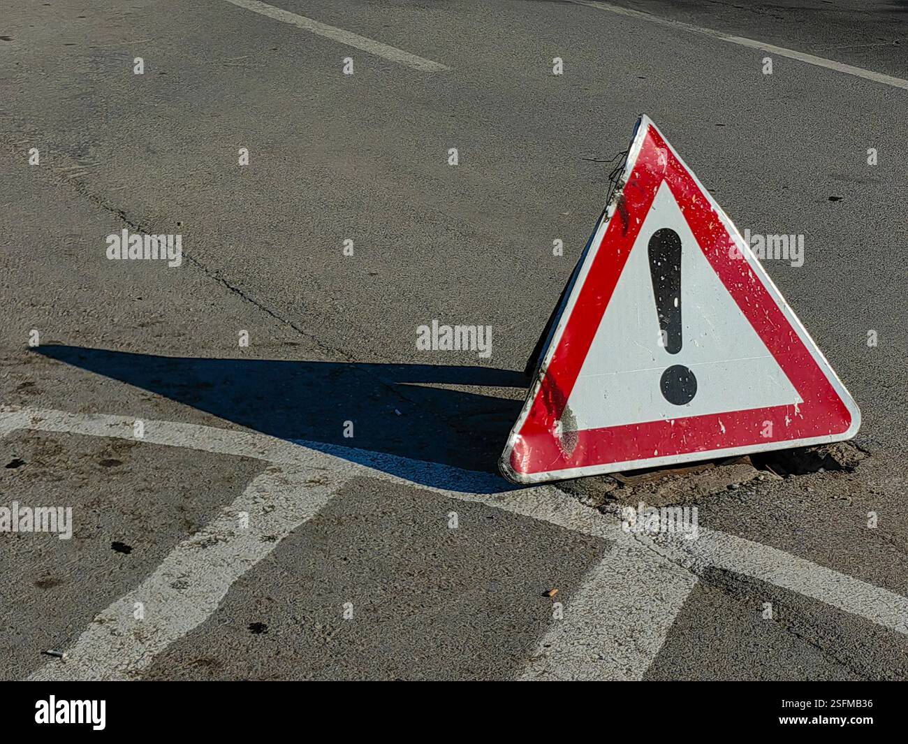 Caution Ahead – Triangle Traffic Sign on Asphalt Stock Photo - Alamy