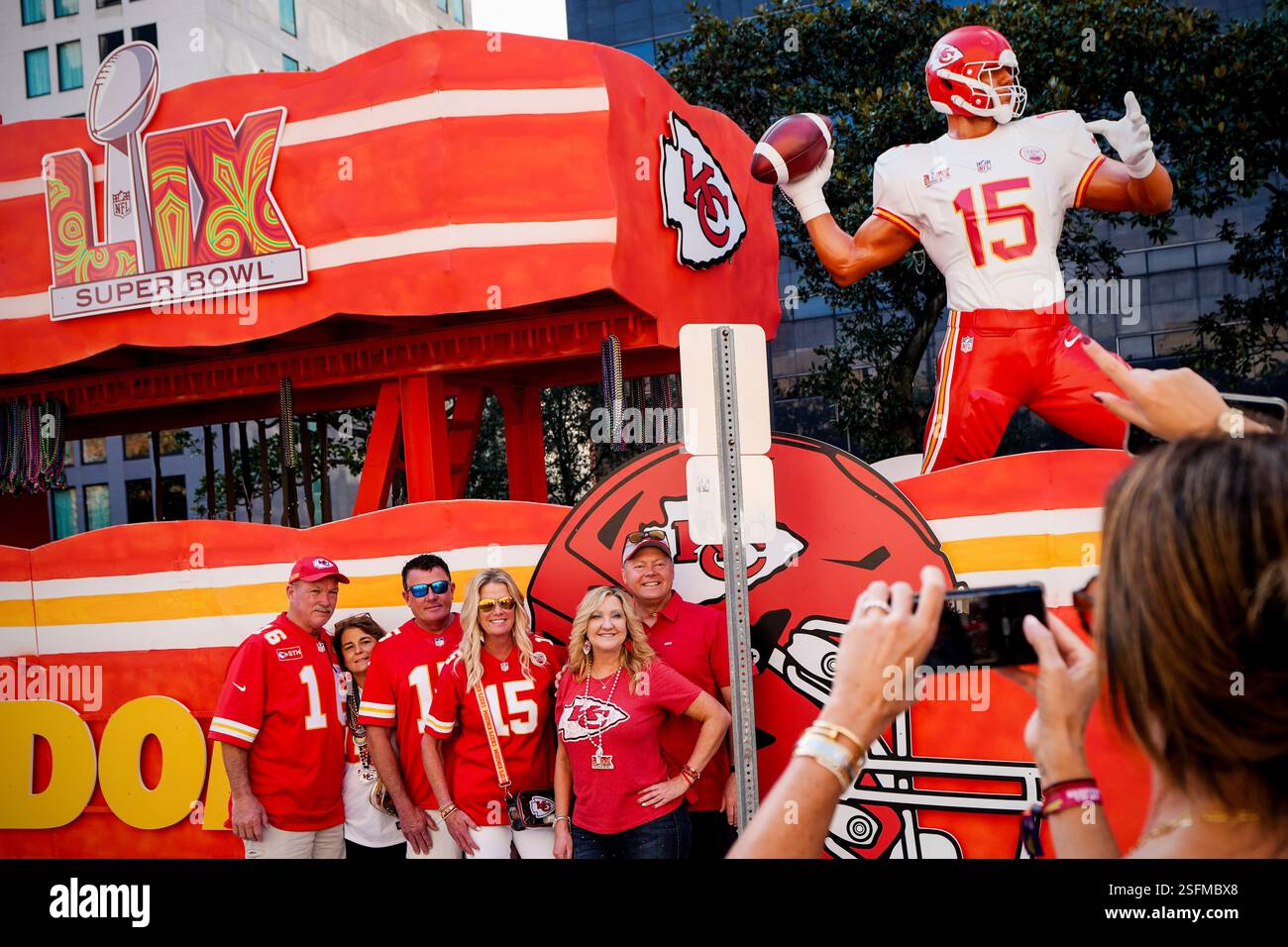 Kansas City Chiefs fans take photos in front of a statue of Kansas City ...