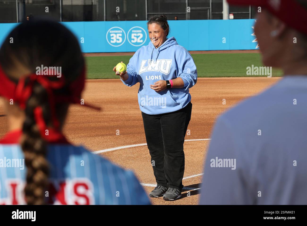 February 8, 2025: LMU Alumni Danielle Kaminaka throws out the first ...
