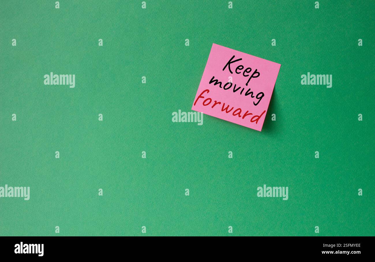 Keep moving forward symbol. Concept words keep moving forward on pink ...