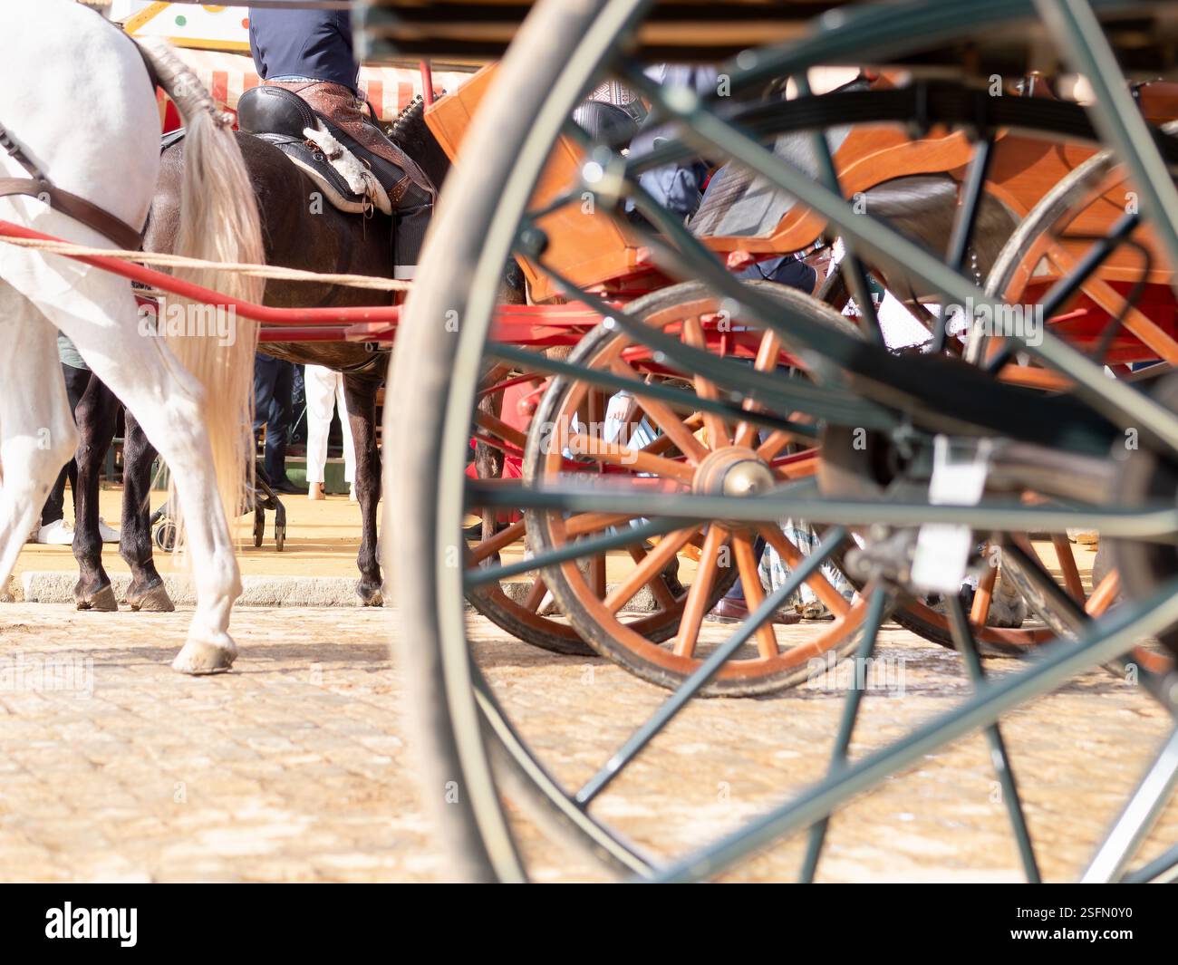 Traditional fair scene with carriage wheel Stock Photo - Alamy
