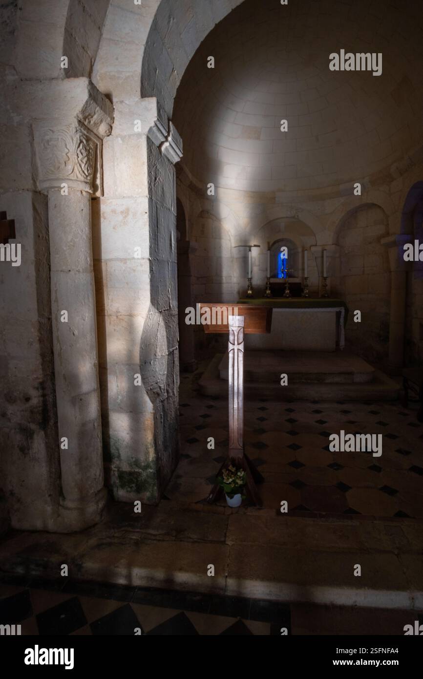vertical view of the choir of romanesque church, with columns and ...