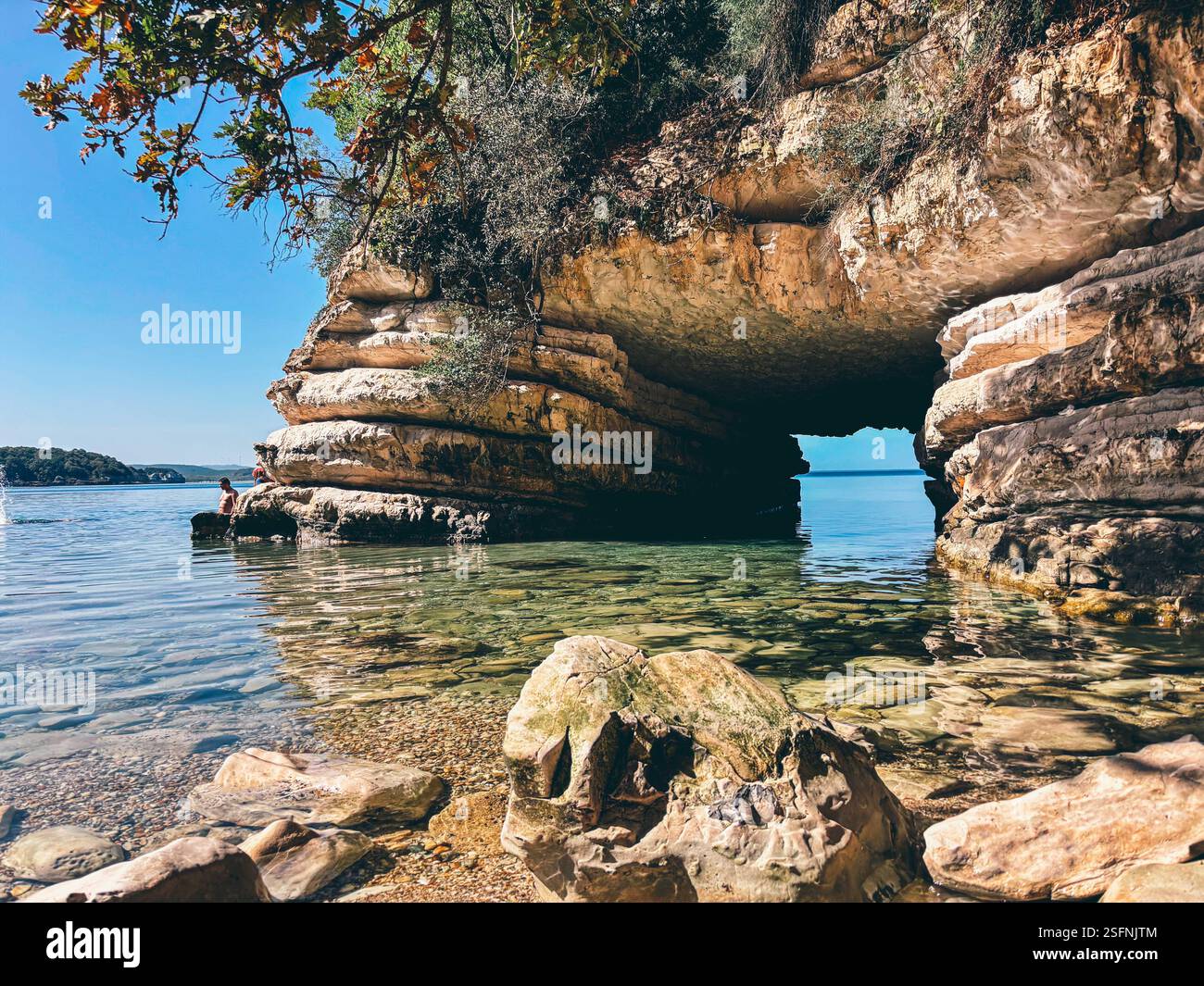 Sandstone rocks and pebble cove beach of Delikli Bay beach near Kerpe ...