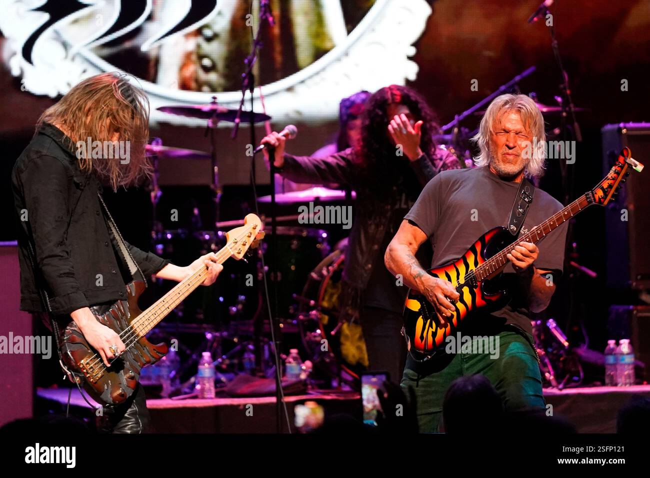Jaron Gulino, left, and George Lynch of Lynch Mob perform on Saturday ...