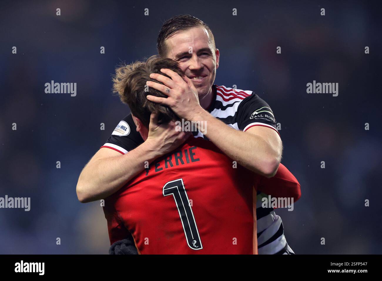 Queen’s Park's Louis Longridge (facing) celebrates with Queen’s Park ...