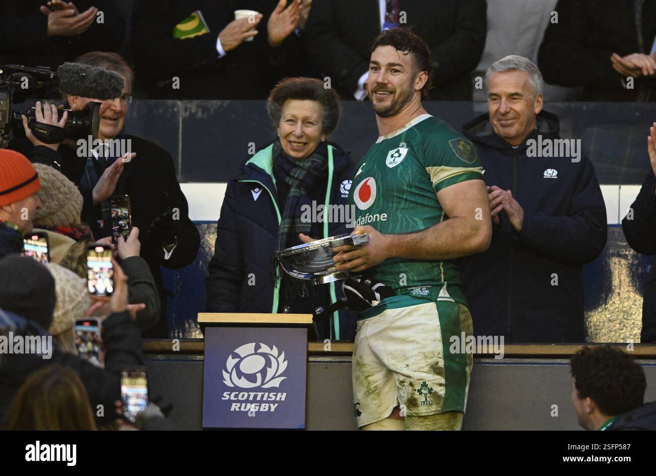 Edinburgh, UK. 9th Feb, 2025. Caelan Doris of Ireland is presented with ...