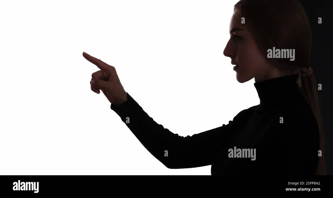 Choosing silhouette. Automated control. Dark outline of confident woman ...