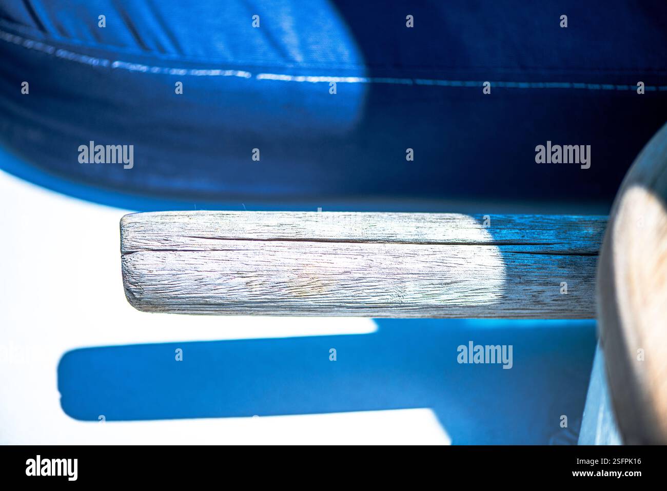 A close-up view of a beautifully crafted wooden ship component ...