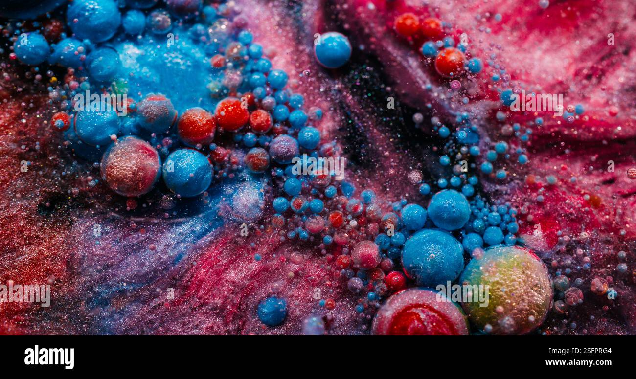 Shimmering flow. Paint glitter drop. Colorful acrylic blue pink gel ...