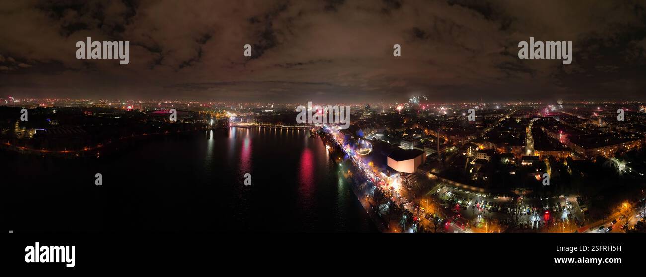 A breathtaking panoramic view of a vibrant urban skyline glittering at ...