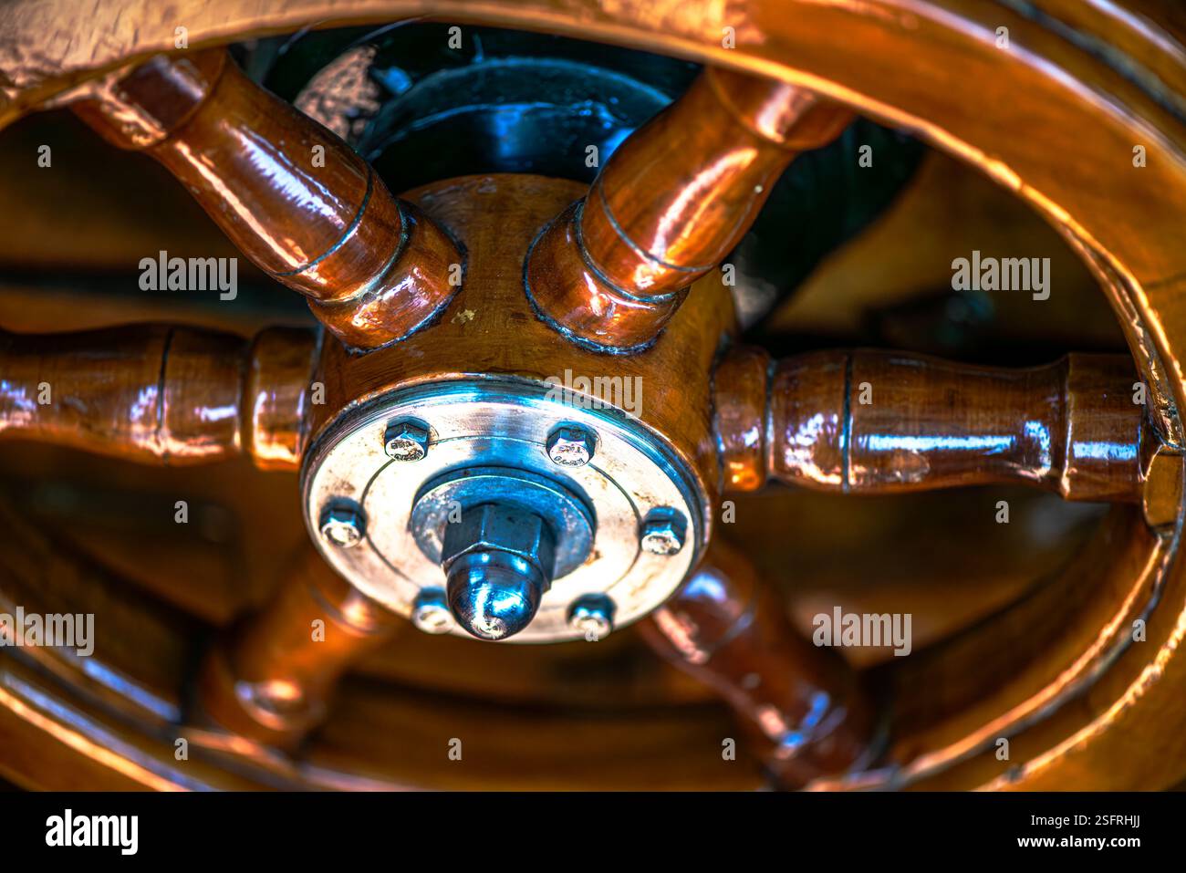 A highly detailed macro shot of a classic wooden ship wheel ...