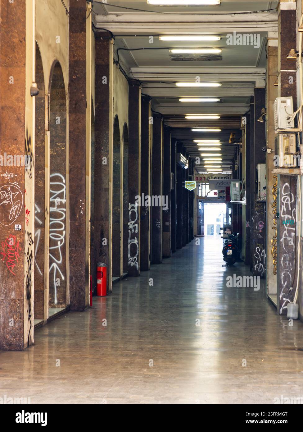 Belgrade, Serbia - January 11, 2025: Long urban corridor with graffiti ...