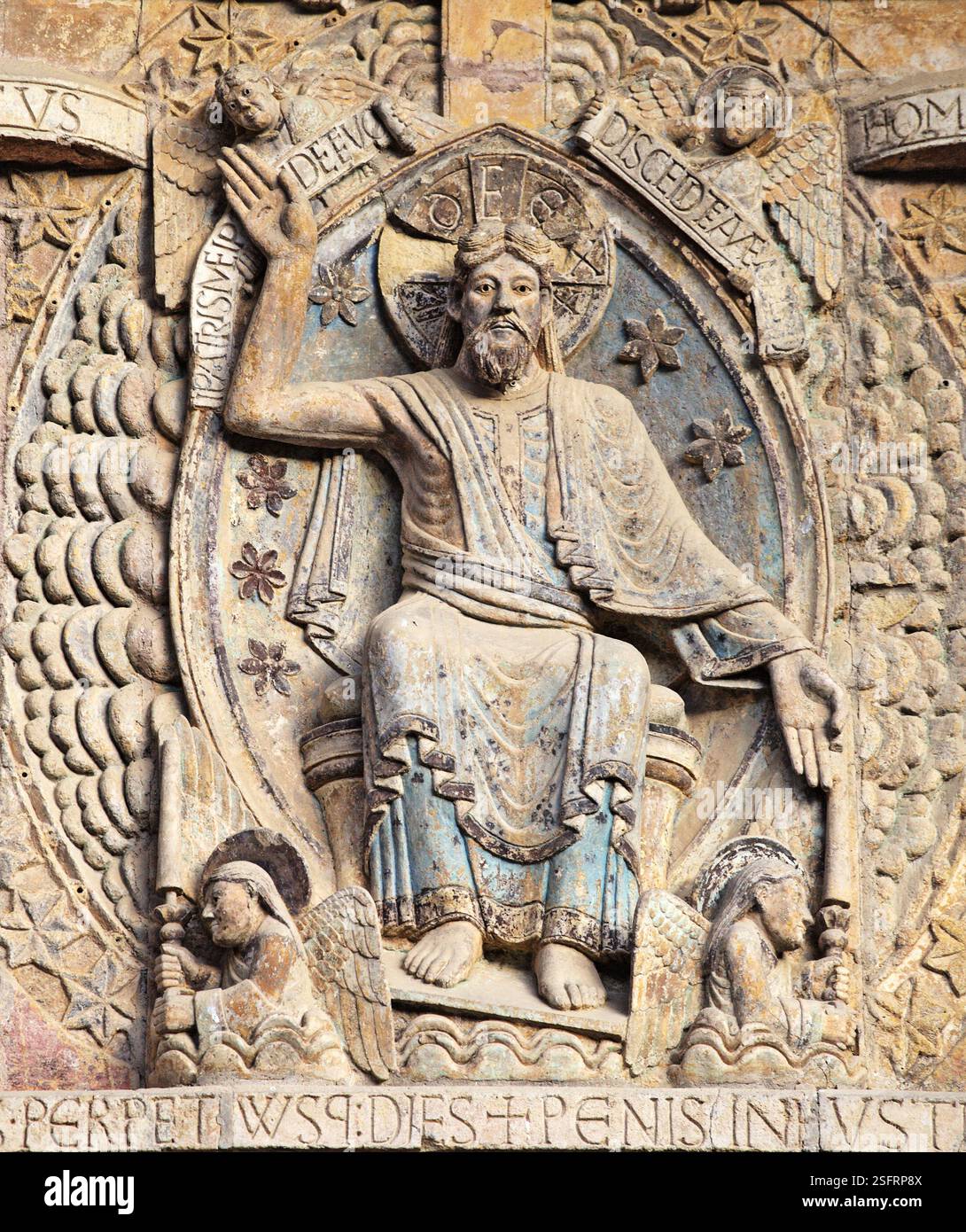 Intricate relief sculpture depicting Christ on a throne, surrounded by ...