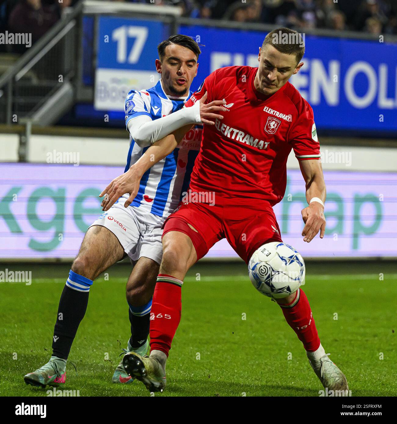 HEERENVEEN - (l-r) Eser Gurbuz of SC Heerenveen, Gustaf Langerbiele of ...