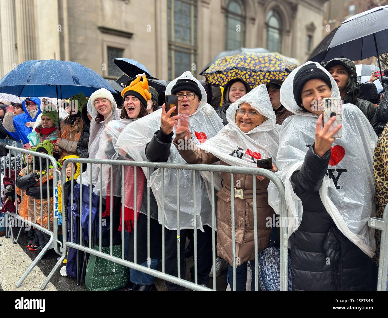 New York, New York, November 28, 2024: A crowd of people watching the ...